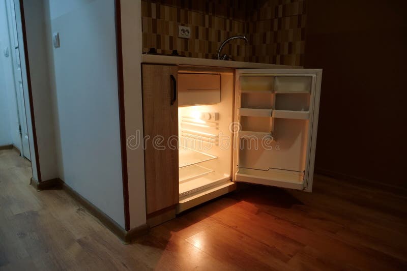 Mini Fridge with Open Door in the Kitchen Stock Photo - Image of ...