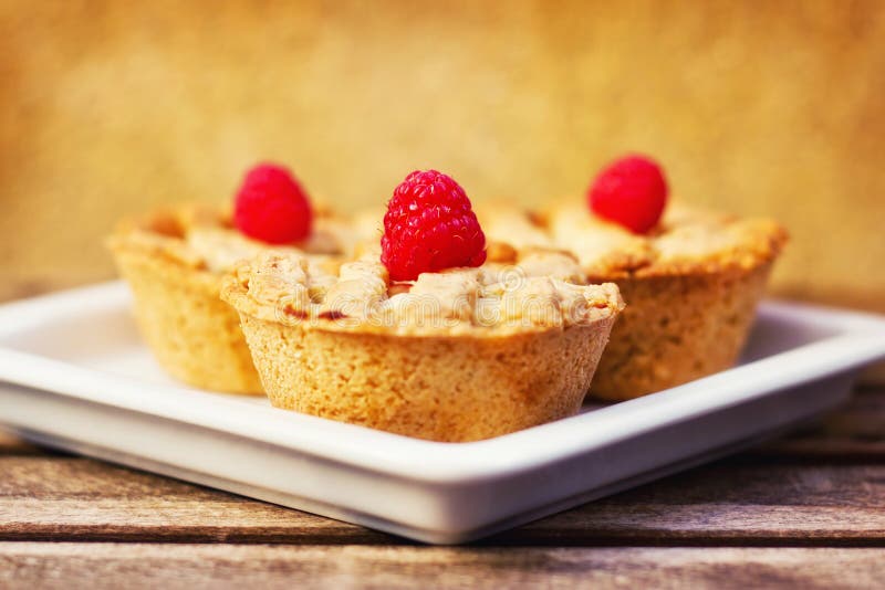 Mini Fruit Pies Decorated with Raspberries Stock Photo - Image of ...