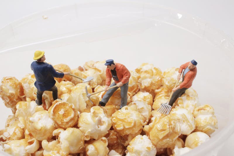 The Mini Fworkker Figure Dig the Popcorn Stock Image - Image of group ...