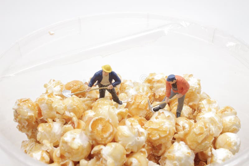 The Mini Fworkker Figure Dig the Popcorn Stock Image - Image of ...