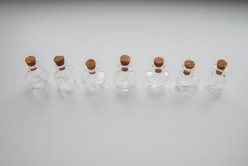 Mini Glass Bottles Different Forms with Cork Stopper on White ...