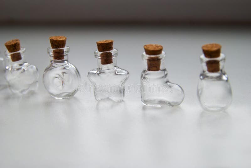 Mini Glass Bottles Different Forms with Cork Stopper on White ...