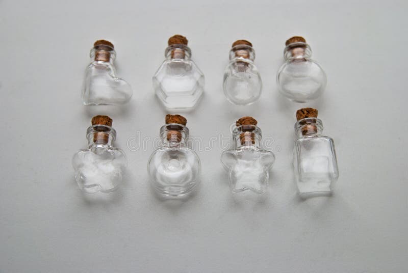 Mini Glass Bottles Different Forms with Cork Stopper on White ...
