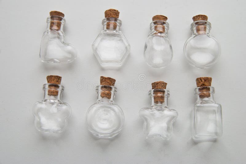 Mini Glass Bottles Different Forms with Cork Stopper on White ...