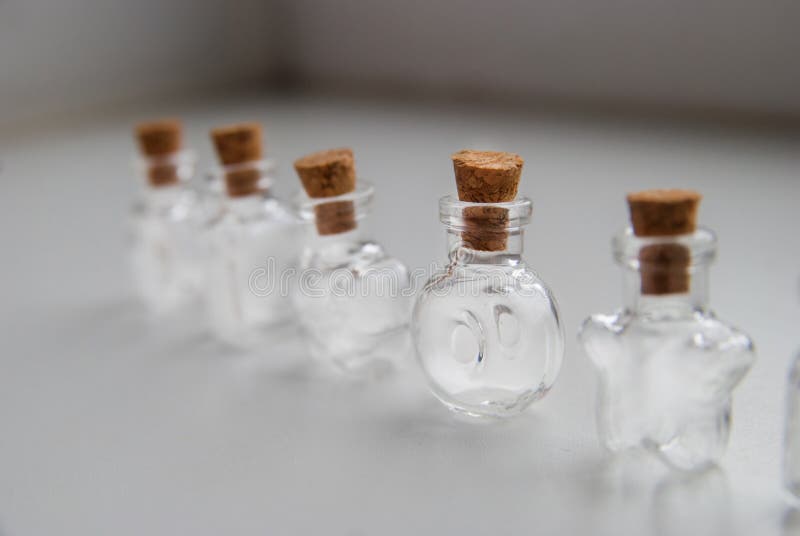 Mini Glass Bottles Different Forms with Cork Stopper on White ...