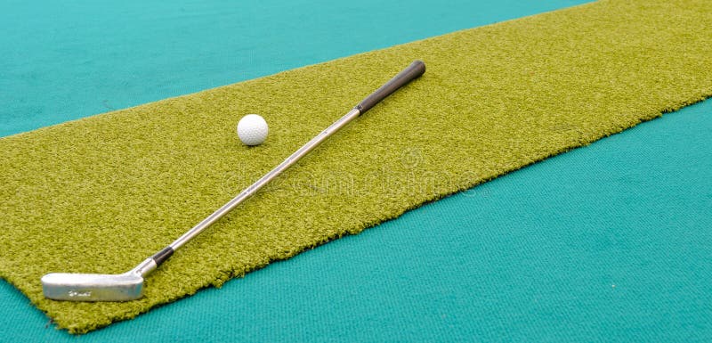 Mini golf stock photo. Image of concentration, blue, grass - 18385216