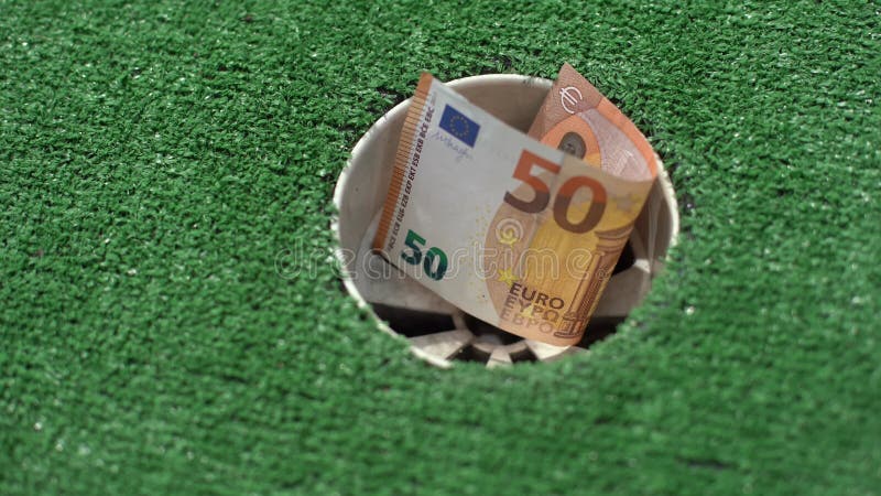 Mini Golf Club, Money on the Artificial Grass Stock Video - Video of ...