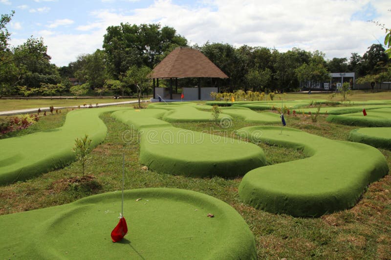 Mini Golf Course with Green Grass and Gazebo Stock Image - Image of ...