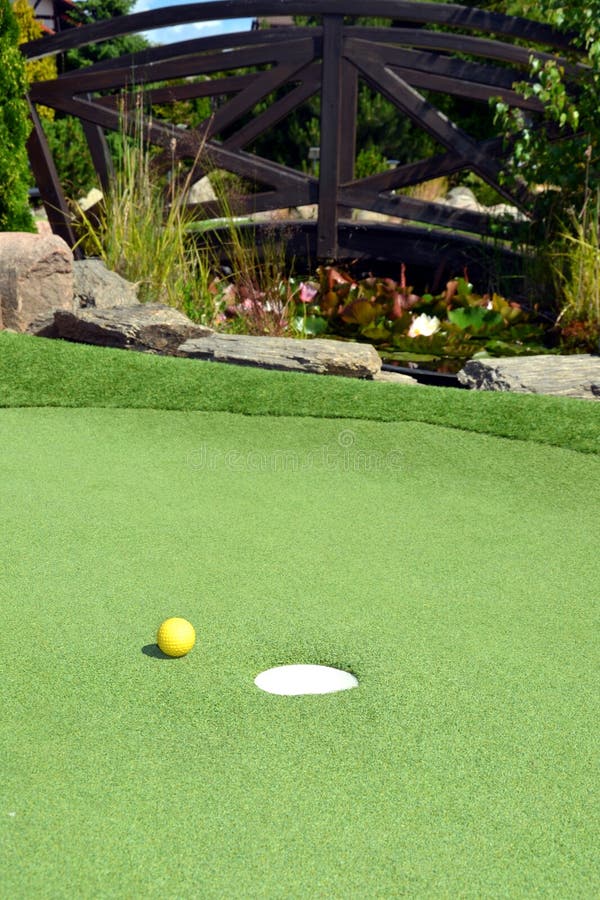 Mini Golf Course, Yellow Mini Golf Ball, Closeup Stock Photo - Image of ...