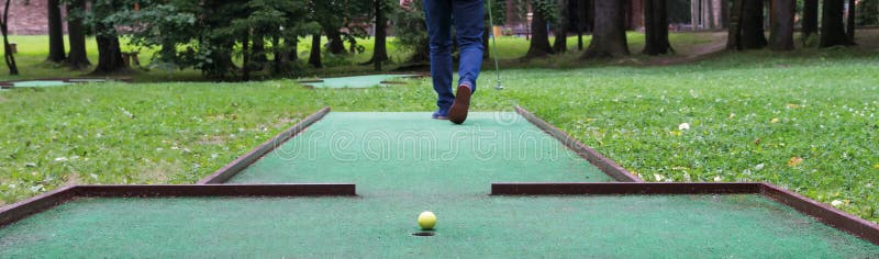 Mini-golf Player Goes for a Kick, Close-up Stock Photo - Image of ...
