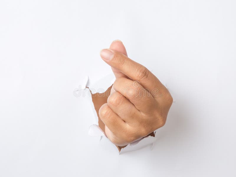 Mini Heart Hand Punching through the Paper Stock Photo - Image of male ...