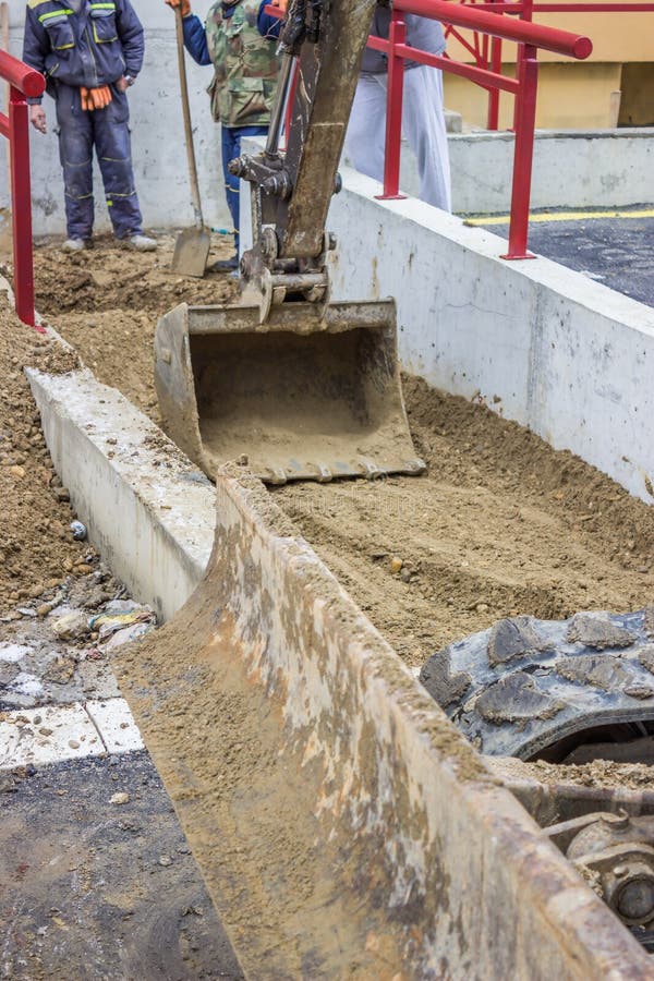 Mini Hydraulic Excavator Arm and a Bucket Working Stock Image - Image ...