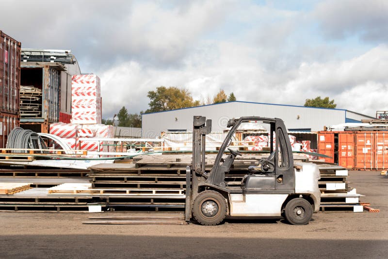 Mini Loader in a Logistics Company. Forklift for Lifting and Moving ...