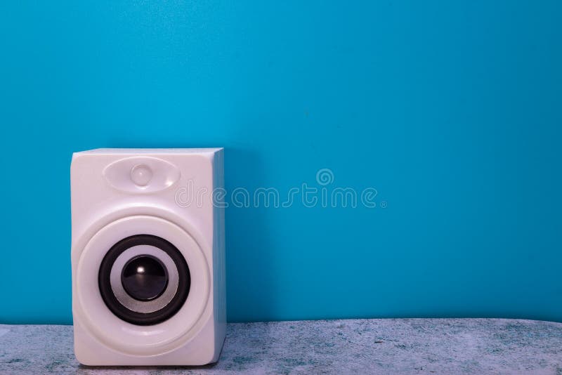 Mini Loud Speaker Isolated on Blue Stock Image - Image of white, modern ...