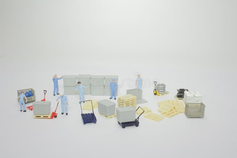 Mini Man Worker Figure Using a Trolley Stock Photo - Image of shipping ...