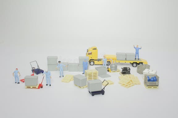 Mini Man Worker Figure Using a Trolley Stock Image - Image of shipping ...