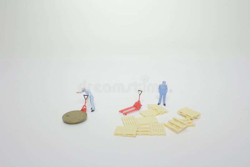 Mini Man Worker Figure Using a Trolley Stock Photo - Image of goods ...