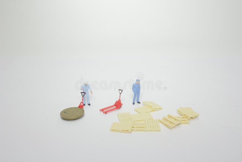 Mini Man Worker Figure Using a Trolley Stock Photo - Image of equipment ...