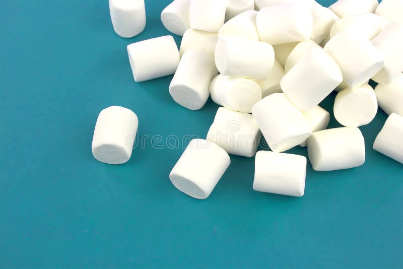 Mini Marshmallows on a Blue Background. Geometric Pattern of White ...