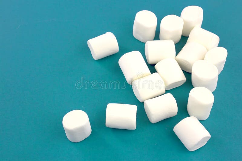 Mini Marshmallows on a Blue Background. Geometric Pattern of White ...