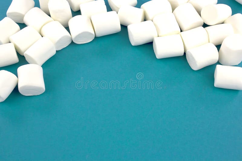 Mini Marshmallows on a Blue Background. Geometric Pattern of White ...