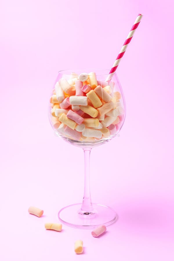 Mini Marshmallows in a Glass on a Blue Background. Copy Space. Close-up ...