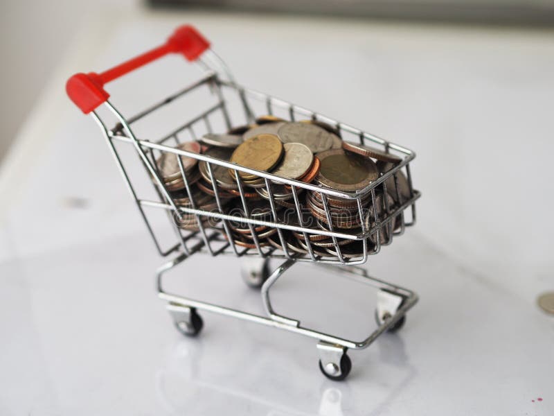 Mini Model Cart Type in the Supermarket and Many Coin Background Out of ...