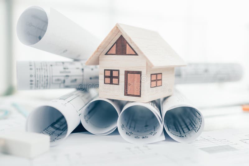 Mini Model House on Roll Blueprint Plan. Architect and Engineer Concept ...