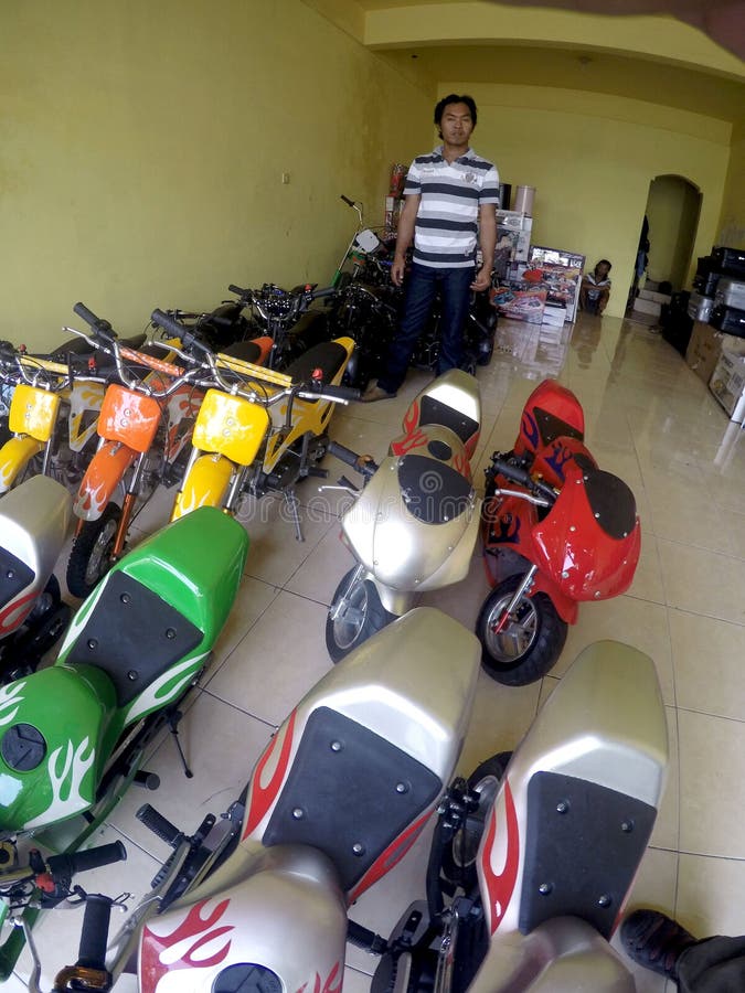 Mini motorcycle editorial photo. Image of room, mini - 49169126