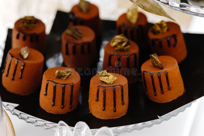 Mini Mousse Pastry Dessert Covered with Chocolate Velour on Festive ...