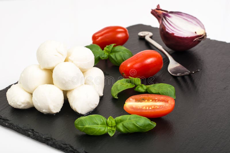 Mini mozzarella balls stock image. Image of cook, food - 84306763