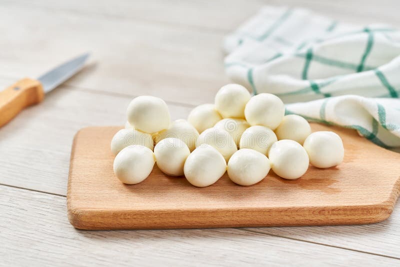 Mini Mozzarella Cheese Balls on a Kitchen Table,with Copy Space for ...