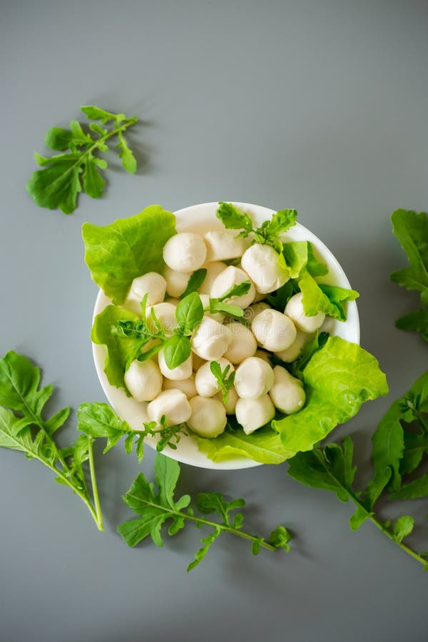 Mini Mozzarella and Herbs Served in Light Bowl Stock Photo - Image of ...
