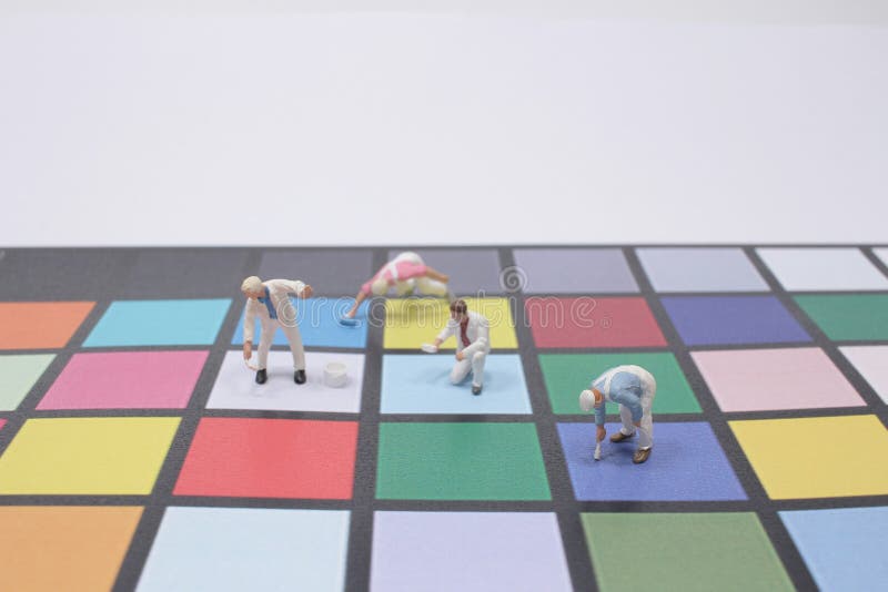 Mini People: Group of Worker Painting Colorful Paper Stock Image ...