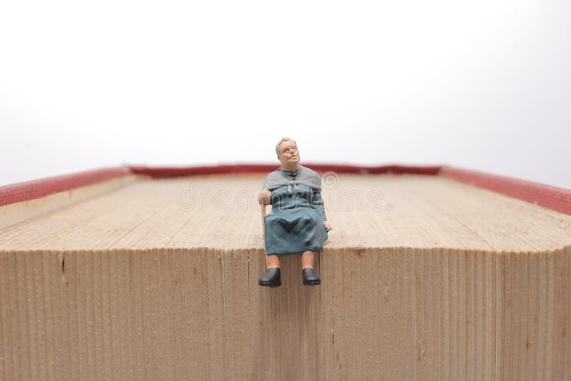 A Mini People Reading with Book, Education or Business Concept Stock ...