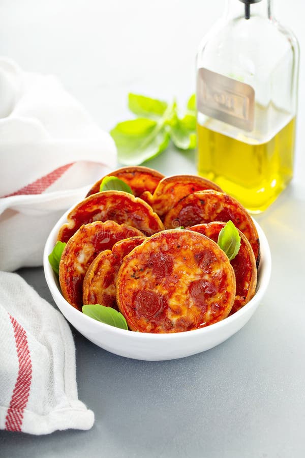 Mini pepperoni pizzas stock image. Image of pepper, lunch - 141665865