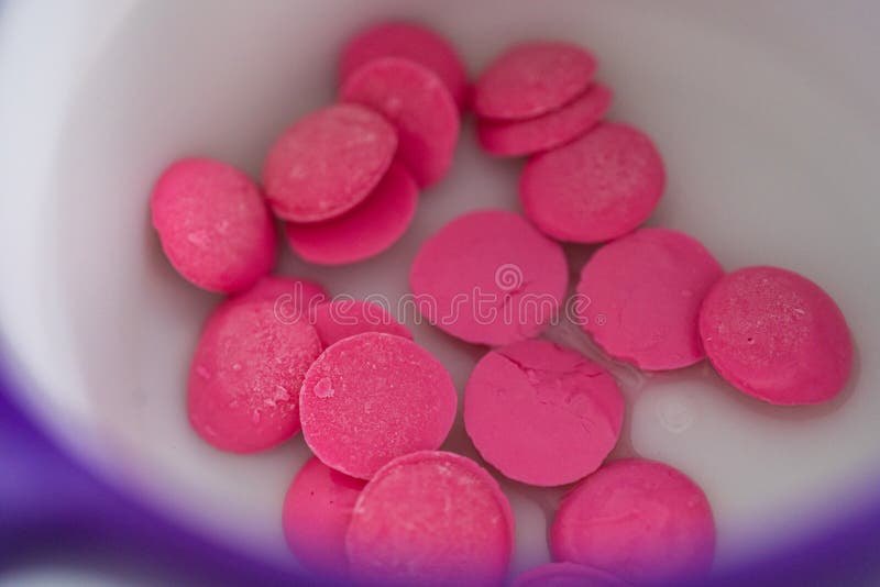 Mini pink chocolates stock image. Image of dessert, chocolate - 276706939