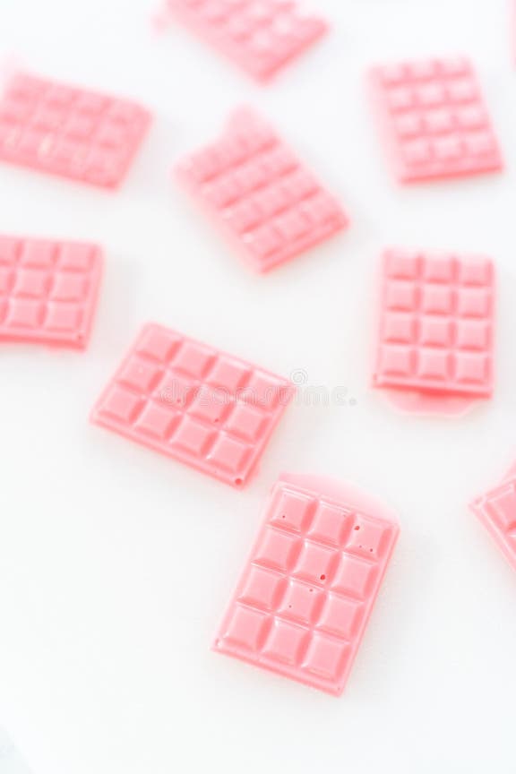 Mini pink chocolates stock image. Image of food, small - 252985059