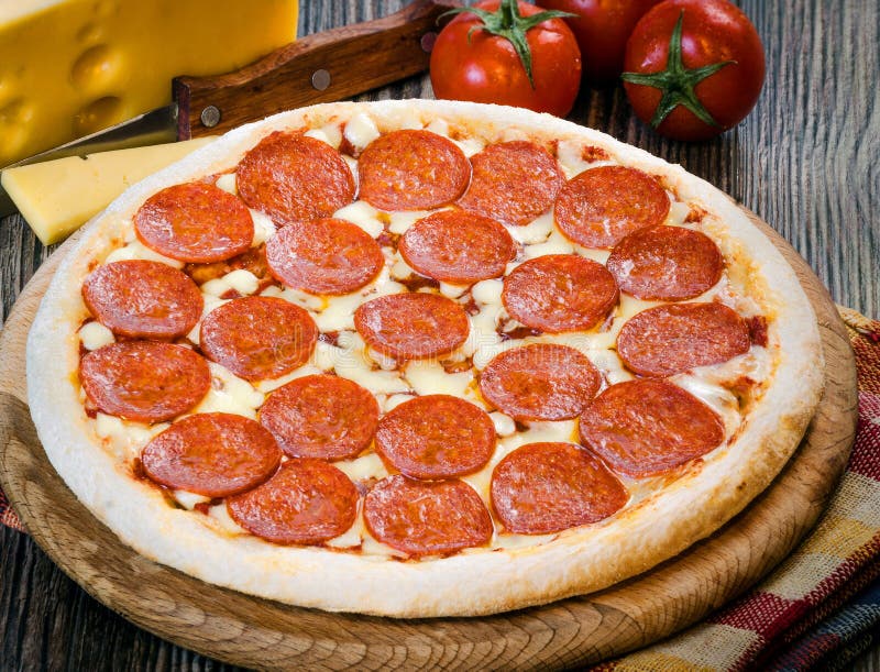 Mini pizza pepperoni stock photo. Image of olives, wood - 75007936