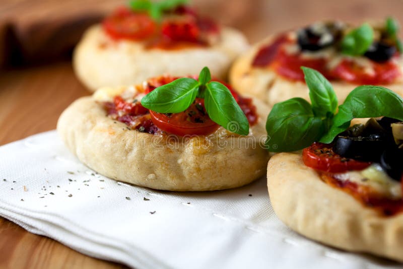 Mini pizzas stock photo. Image of diet, herbs, tomatoes - 12619902
