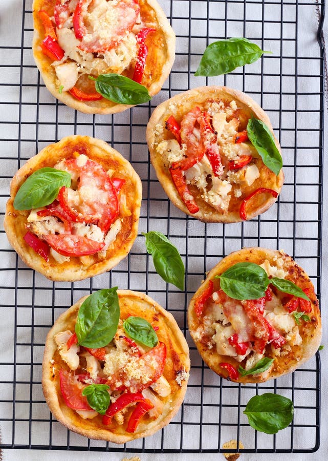 Mini pizzas stock image. Image of tart, rack, tomato - 57943737