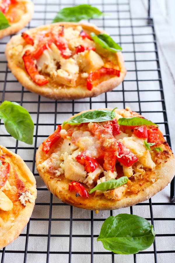 Mini pizzas stock image. Image of tart, rack, tomato - 57943737