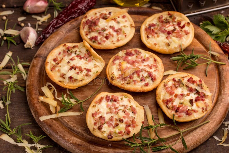 Mini Pizzas on Baking Tray stock photo. Image of pizzas - 138258340