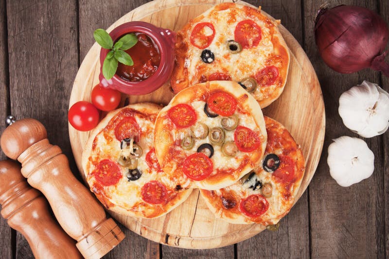 Mini pizzas stock photo. Image of photograph, olive, tomato - 55826368
