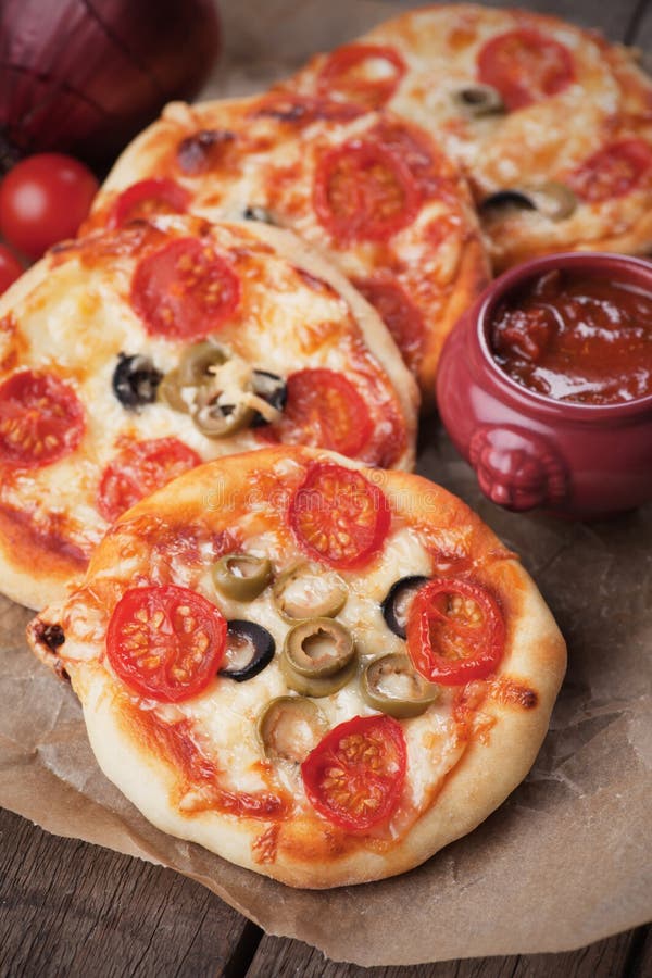 Mini pizzas stock photo. Image of cheese, food, tomato - 60433228