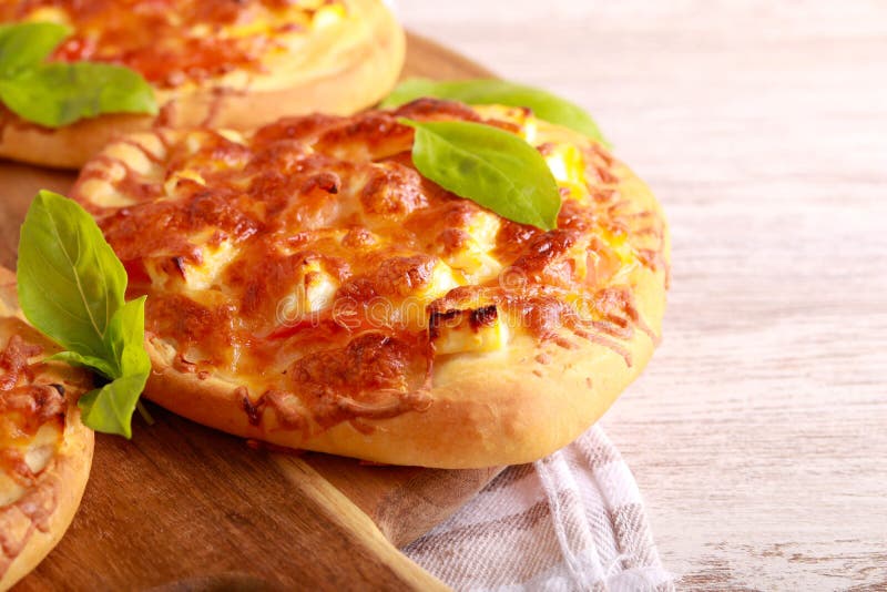 Mini Pizzas with Mixed Cheese Stock Photo - Image of mini, brunch ...