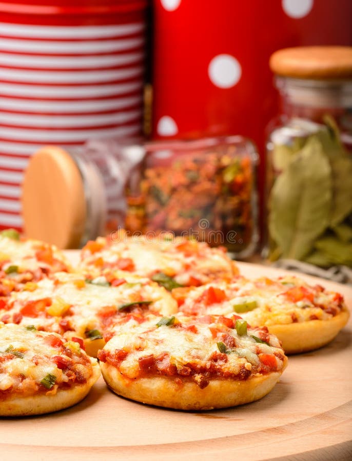 Mini Pizzas on Wooden Board. Stock Photo - Image of cheese, italian ...