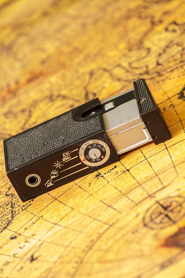 Mini Pocket Pocket Camera on a Wooden Board with a World Map Stock ...