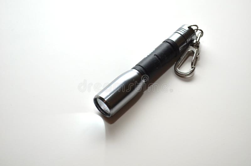 A Mini Pocket Torch on White Stock Image - Image of flaming, ring ...