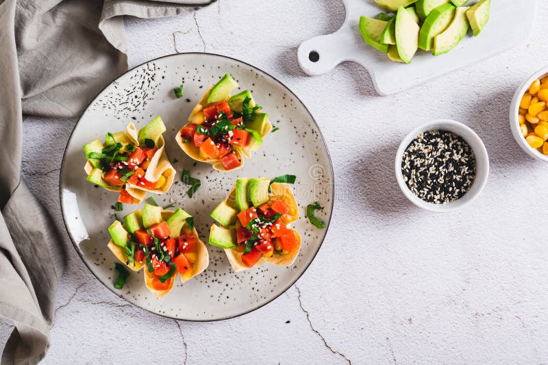Mini Poke Bowls in Pita Bread on a Plate on the Table Top View Stock ...